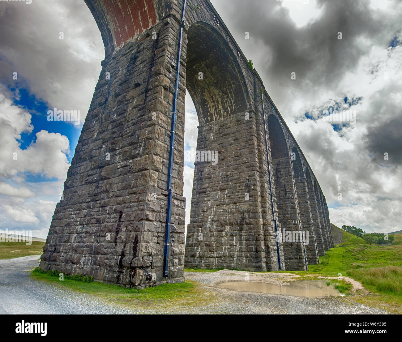 Closeup view of a large old Victorian railway viaduct across valley in ...