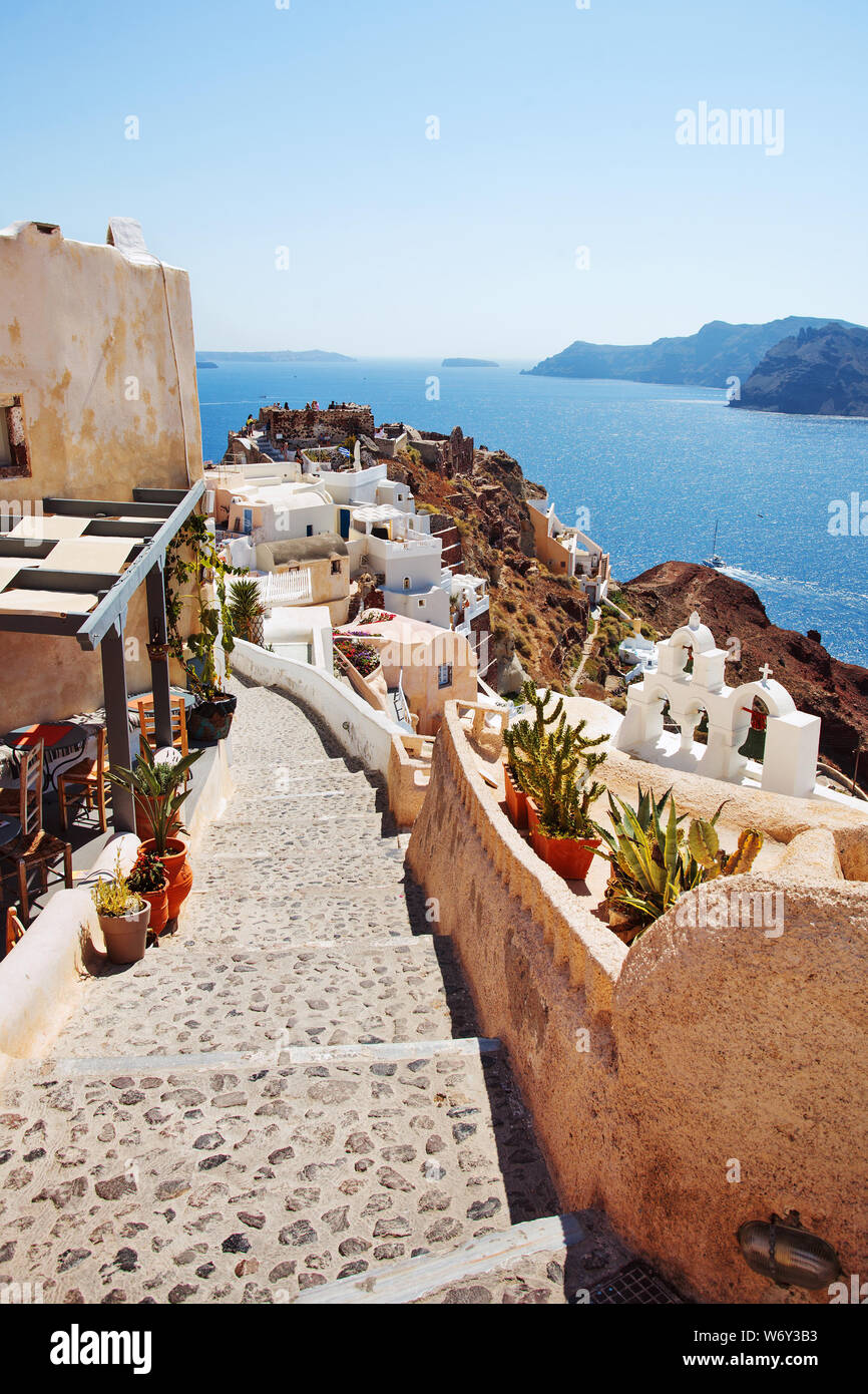Walking path in Oia with caldera view. Santorini, Greece Stock Photo ...