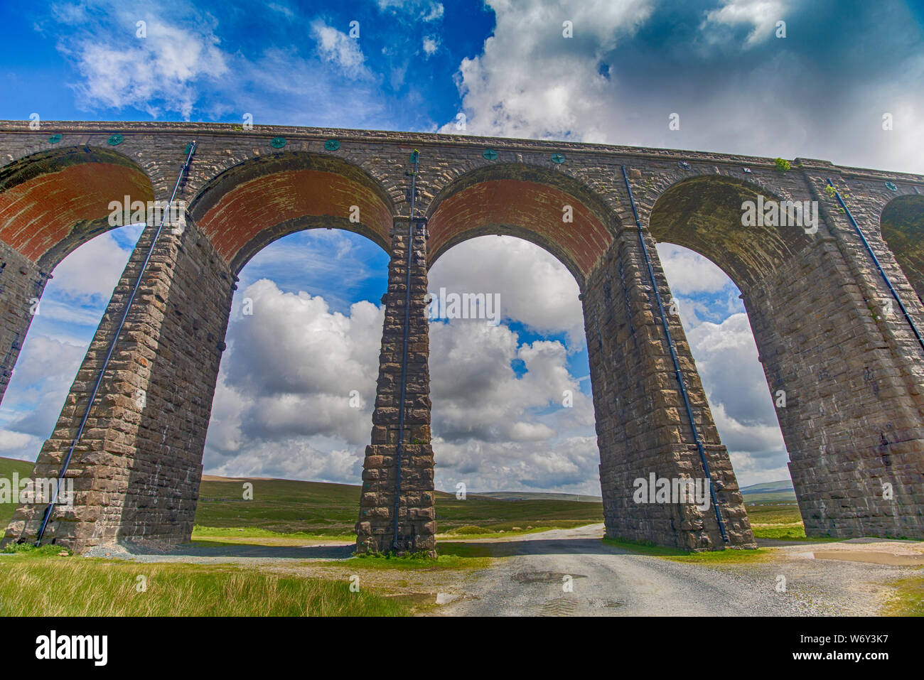 Closeup view of a large old Victorian railway viaduct across valley in ...
