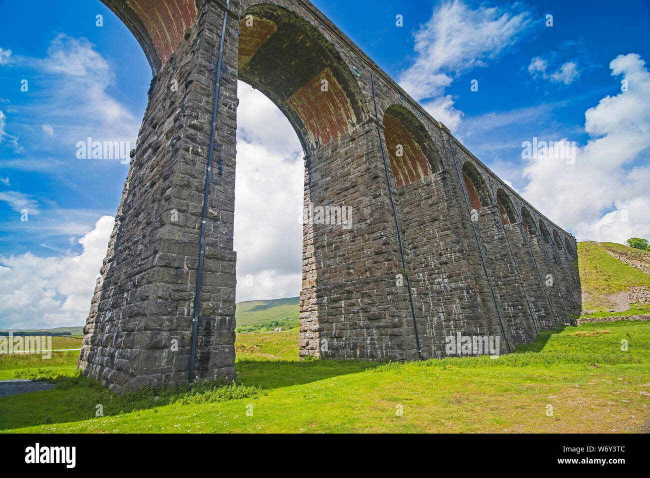 Closeup view of a large old Victorian railway viaduct across valley in ...