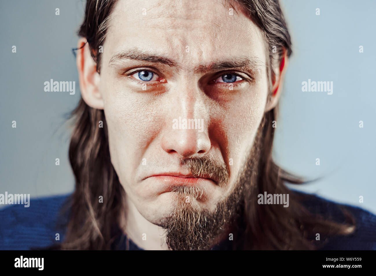 the guy with the long hair and the half-face beard Stock Photo - Alamy