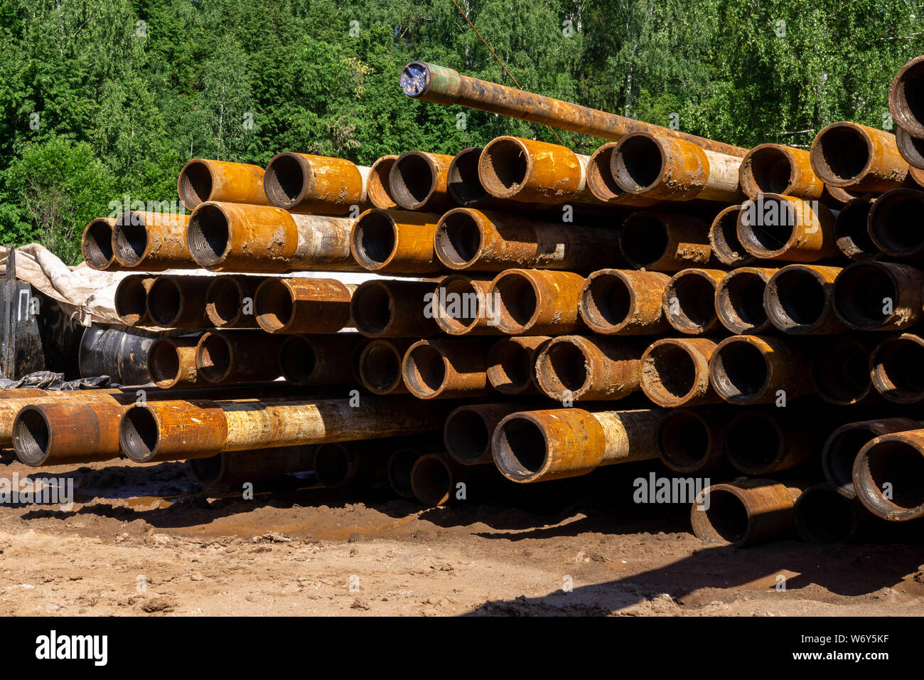 Oil Drill pipe. Rusty drill pipes were drilled in the well section ...