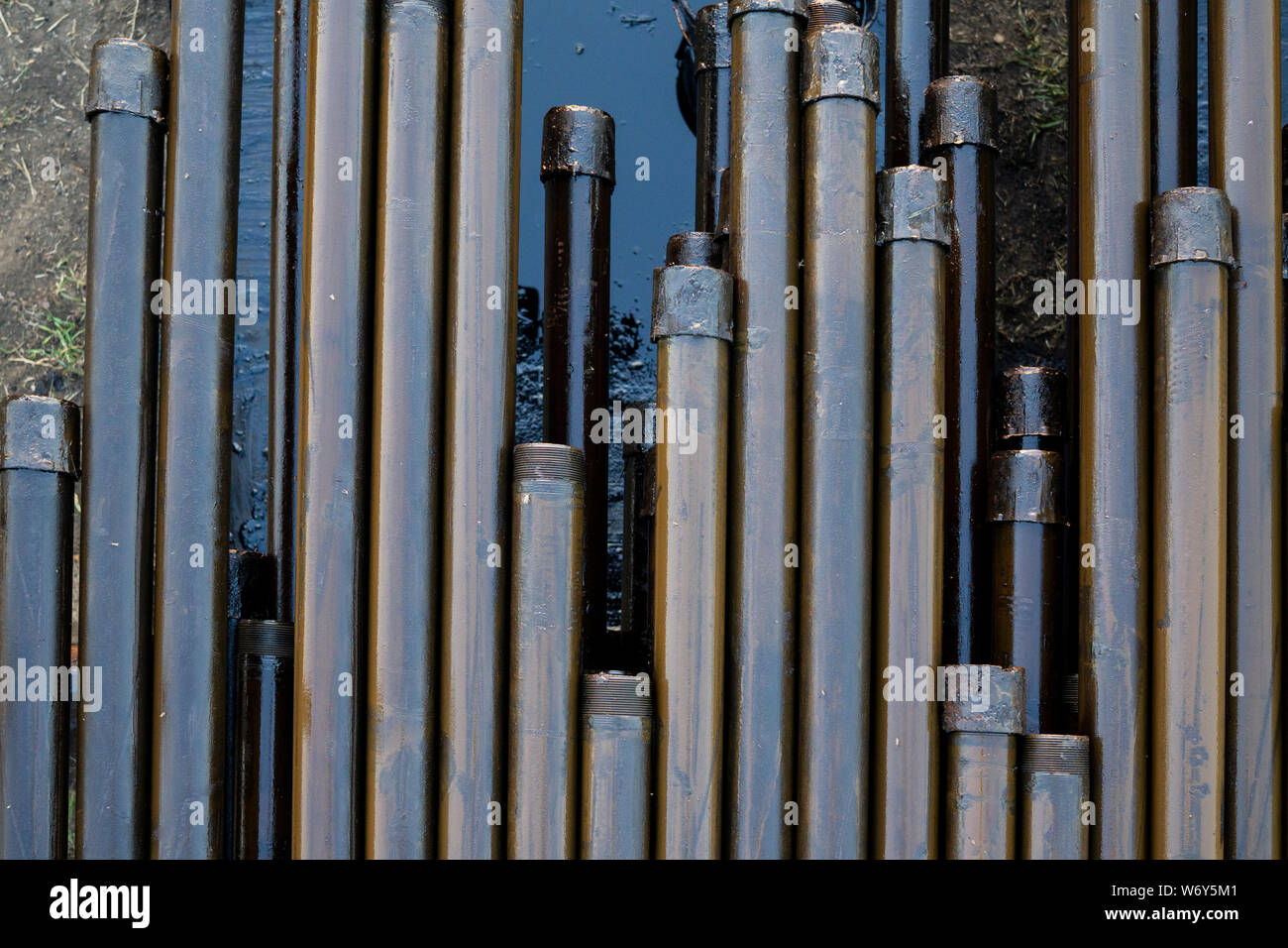 Oil Drill pipe. Rusty drill pipes were drilled in the well section ...
