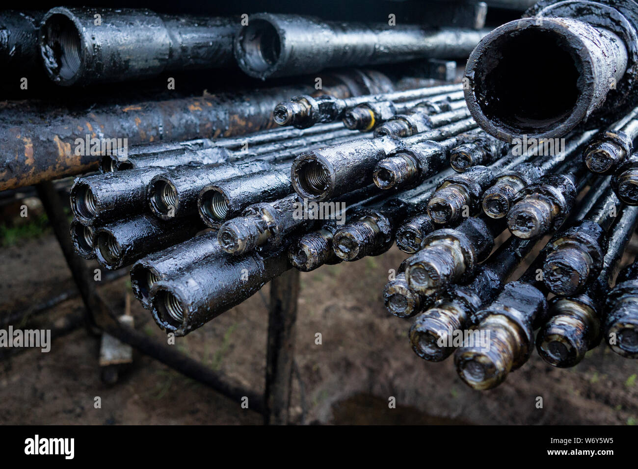 Oil Drill pipe. Rusty drill pipes were drilled in the well section ...