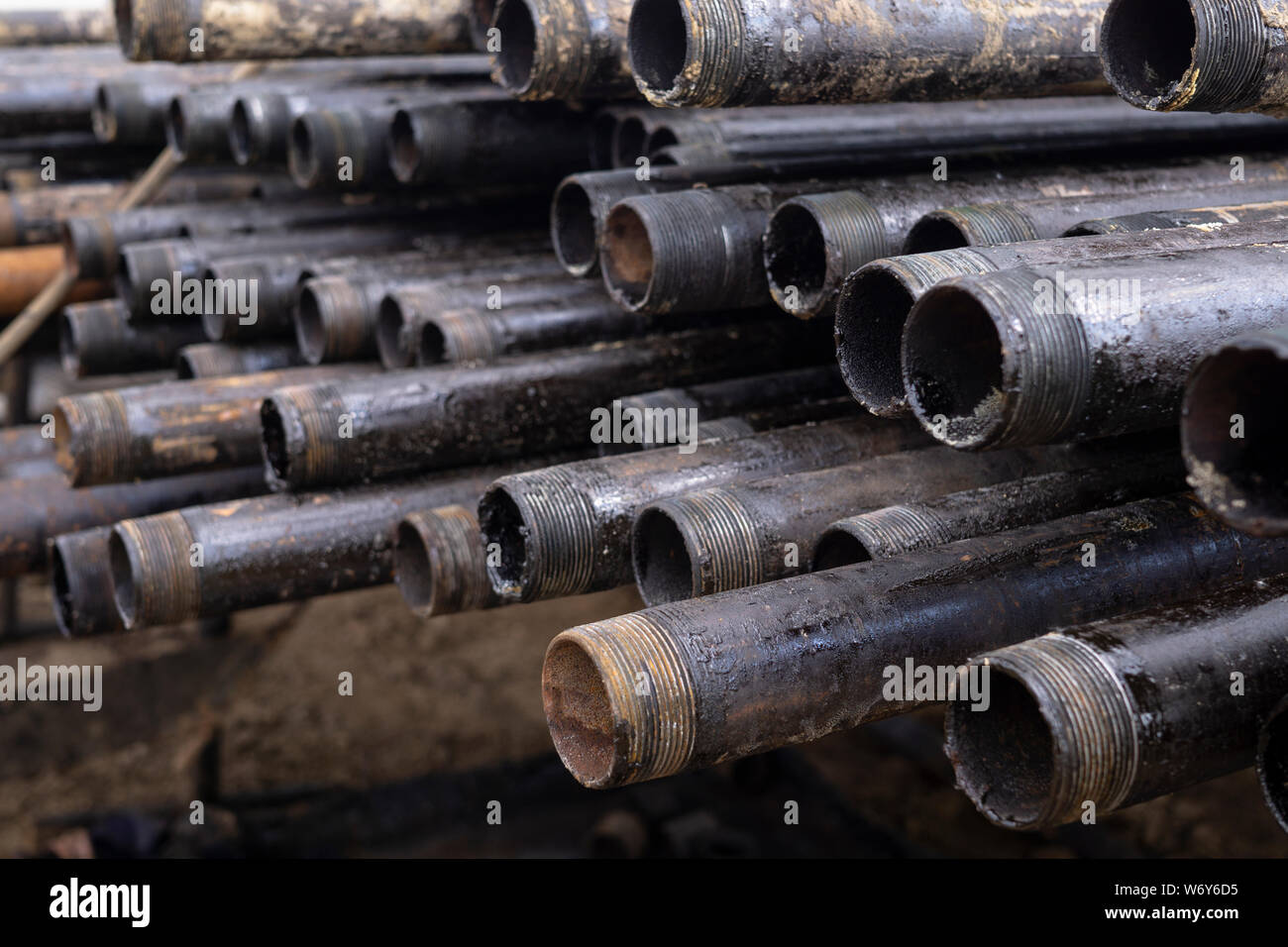 Oil Drill pipe. Rusty drill pipes were drilled in the well section ...