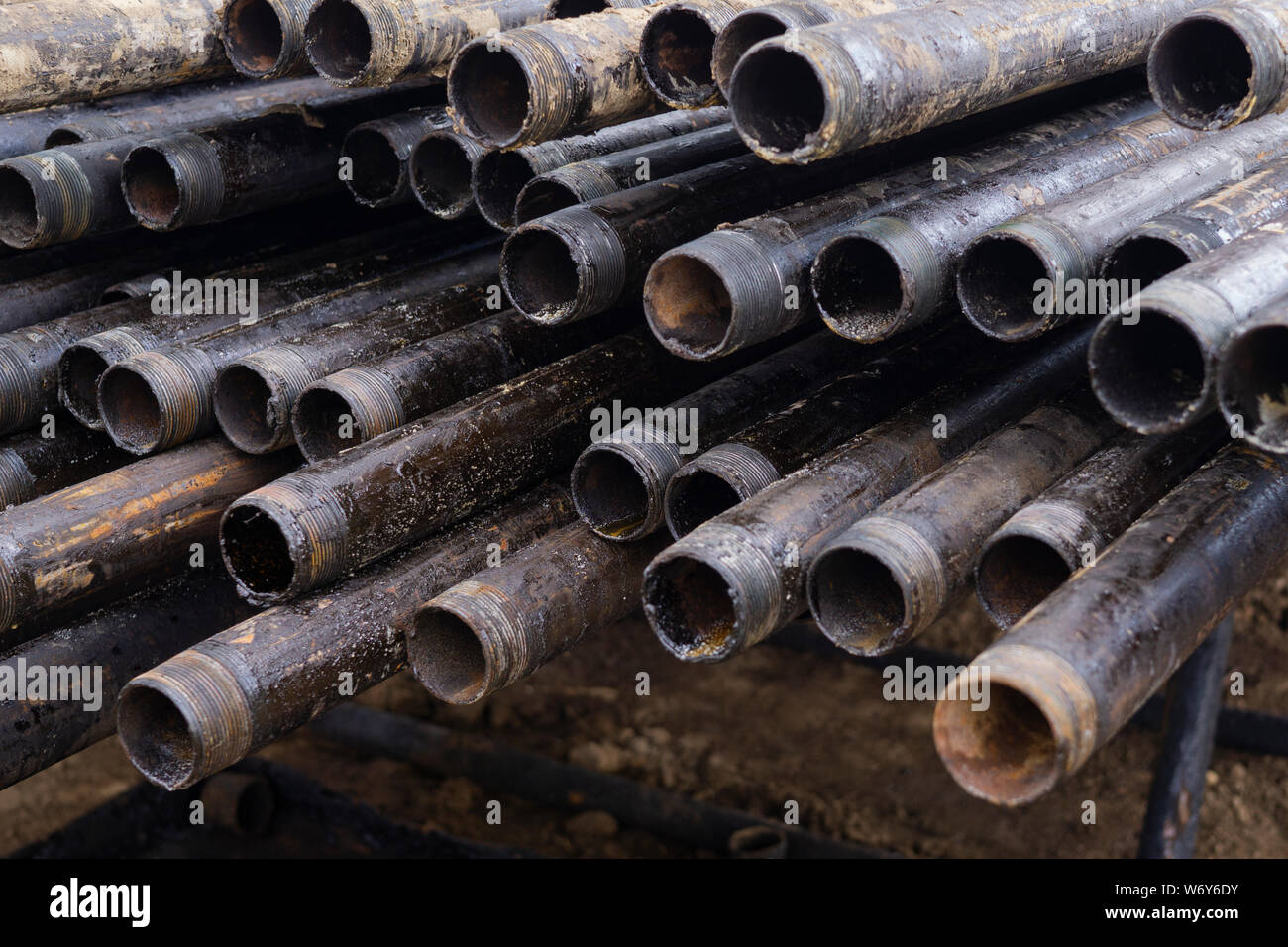 Oil Drill pipe. Rusty drill pipes were drilled in the well section ...