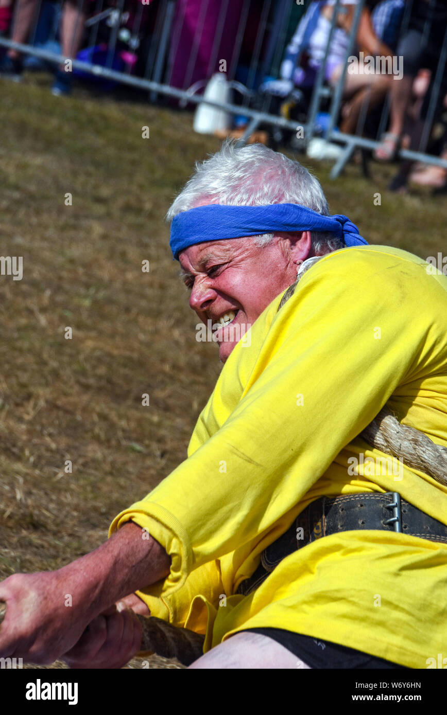 Tug of war,rope pulling,a sport that pits two teams against each other ...