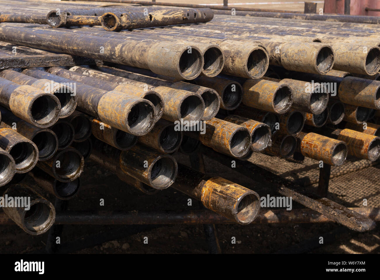 Oil Drill pipe. Rusty drill pipes were drilled in the well section ...