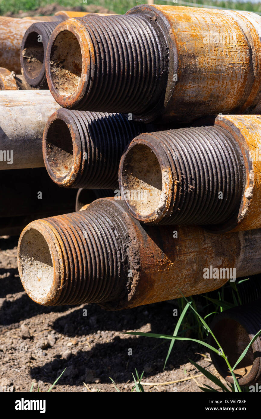 Oil Drill pipe. Rusty drill pipes were drilled in the well section ...