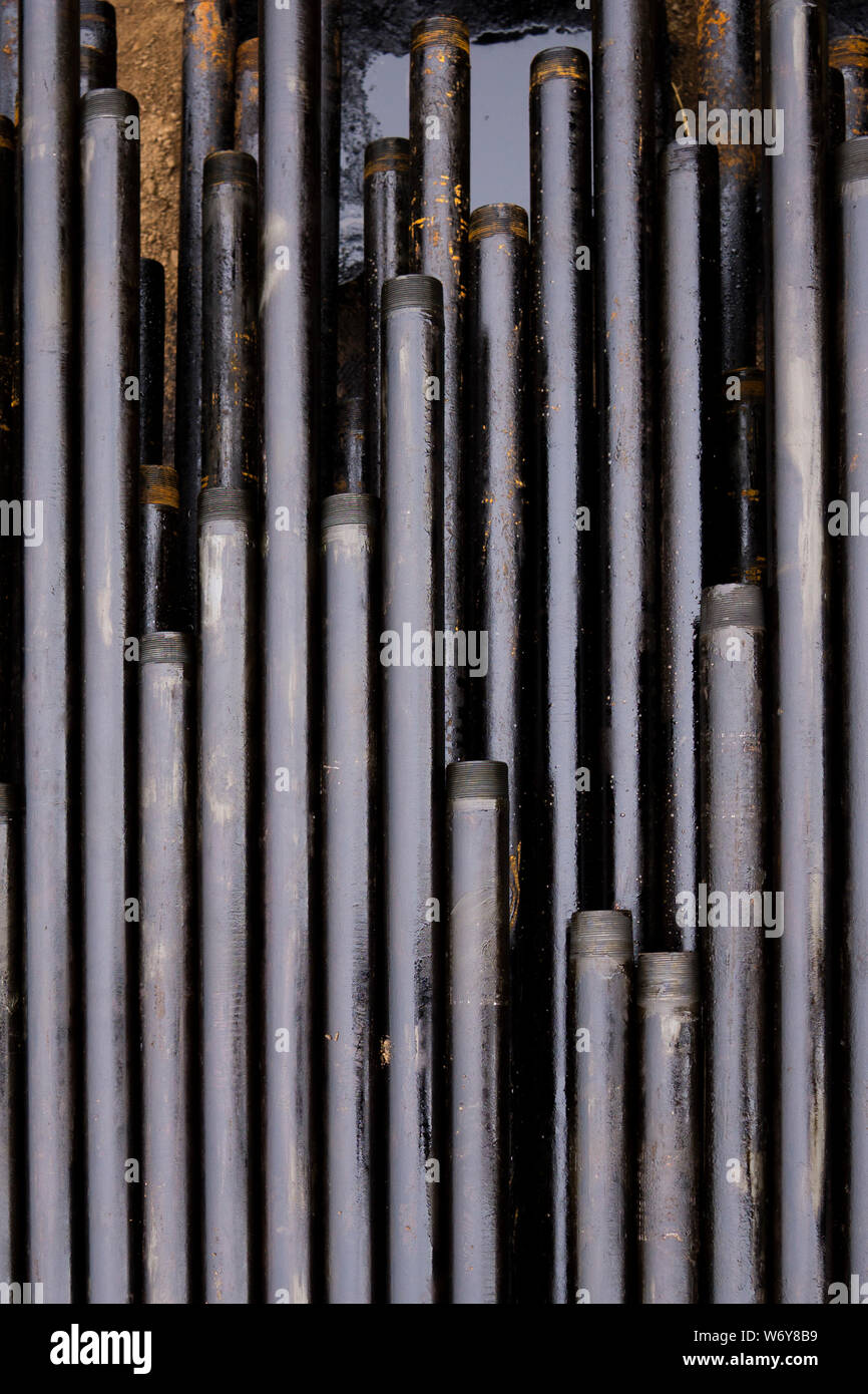 Oil Drill pipe. Rusty drill pipes were drilled in the well section ...