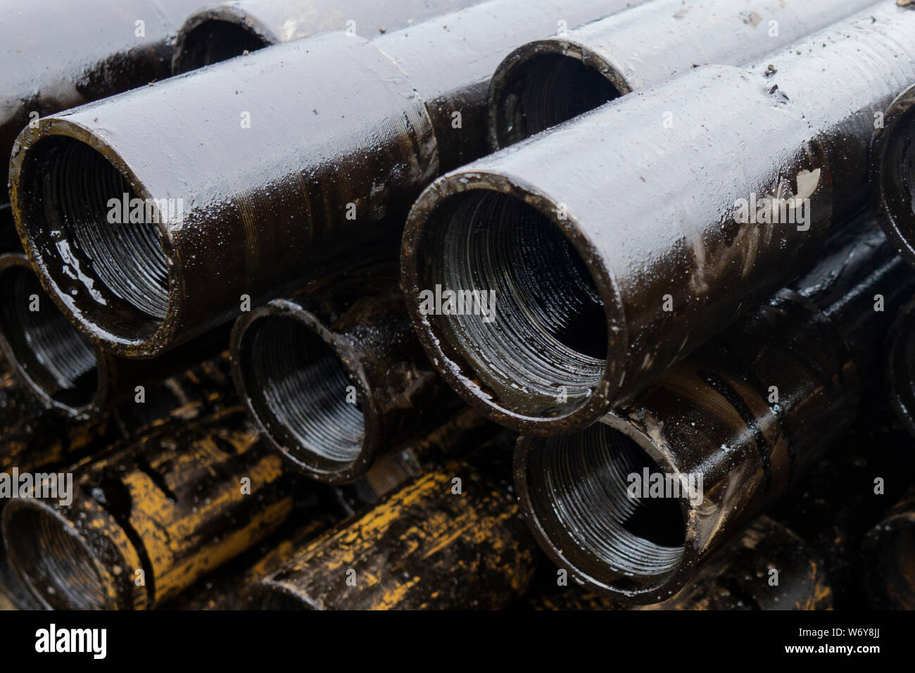 Oil Drill pipe. Rusty drill pipes were drilled in the well section ...
