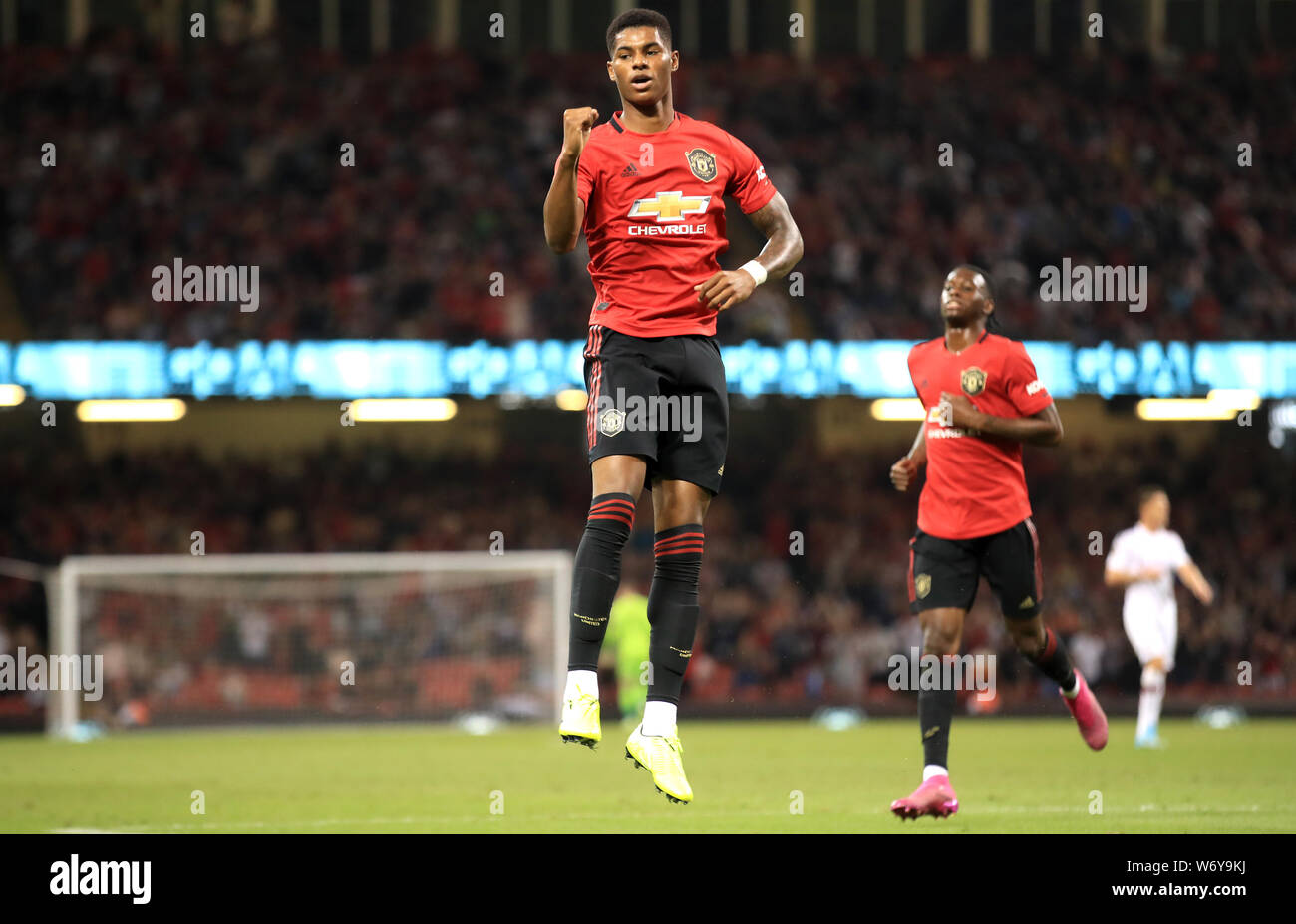 Manchester United's Marcus Rashford celebrates scoring his side's first ...