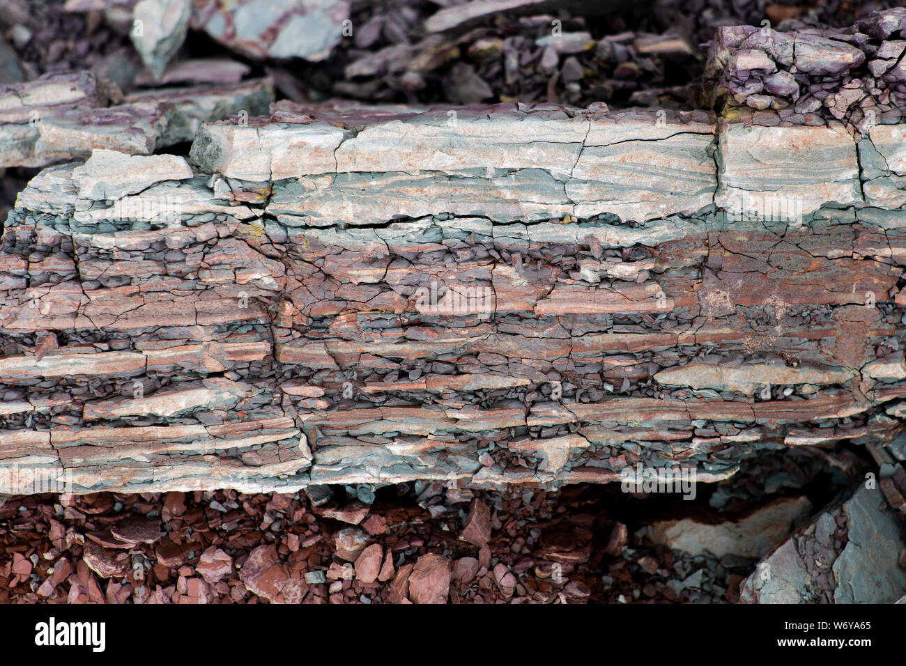 Soil cut-sandstone, stones, clay, sand structure and layers. slice of ...