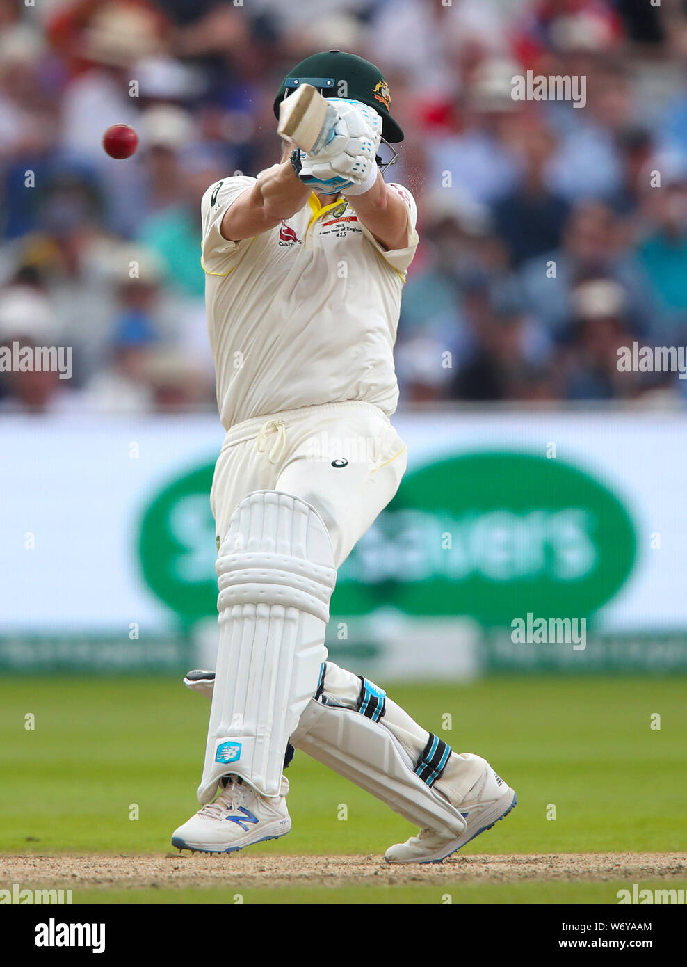 Australia's Steve Smith is hit on the head by a cricket ball during day ...