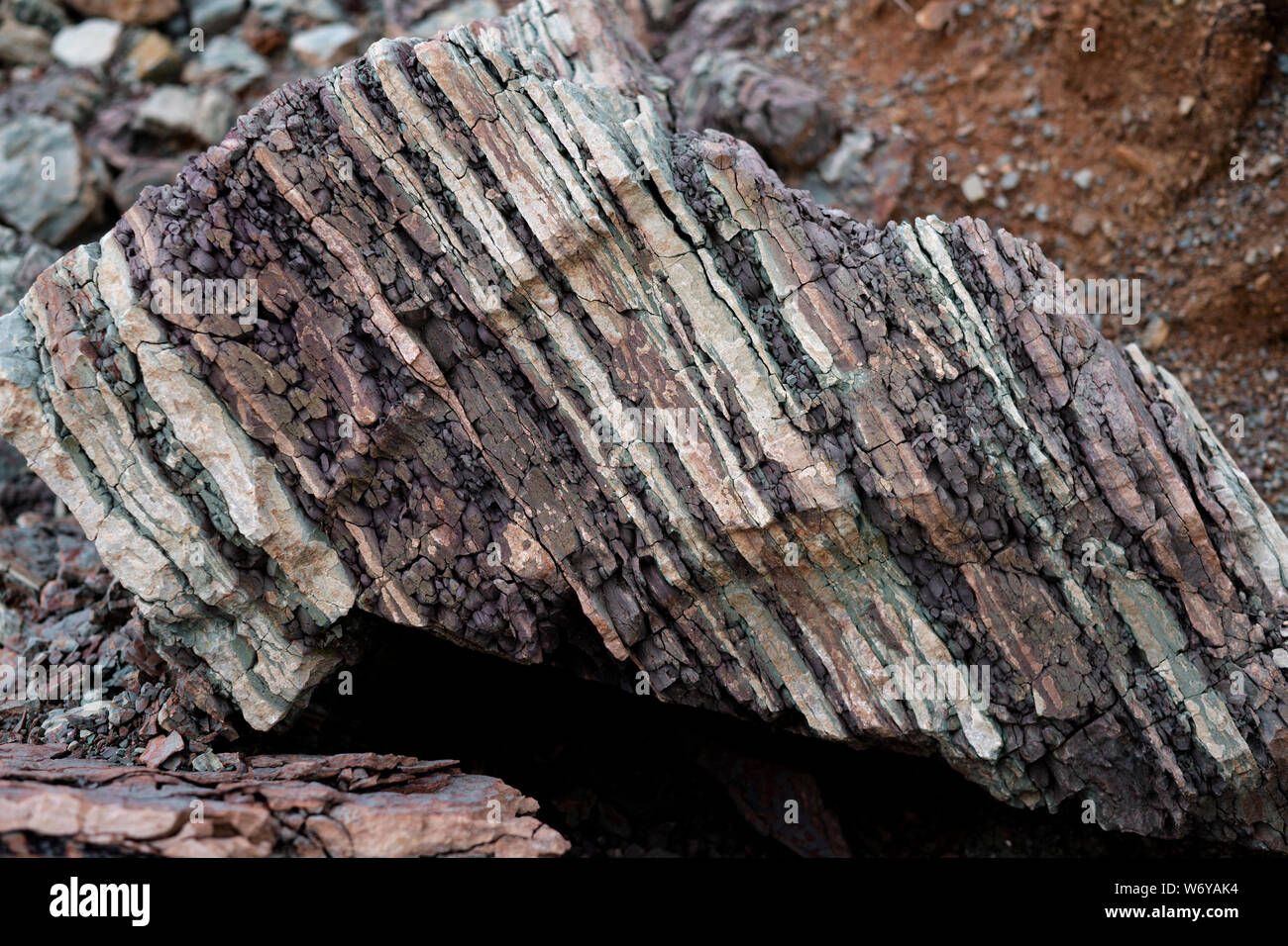 Soil cut-sandstone, stones, clay, sand structure and layers. slice of ...