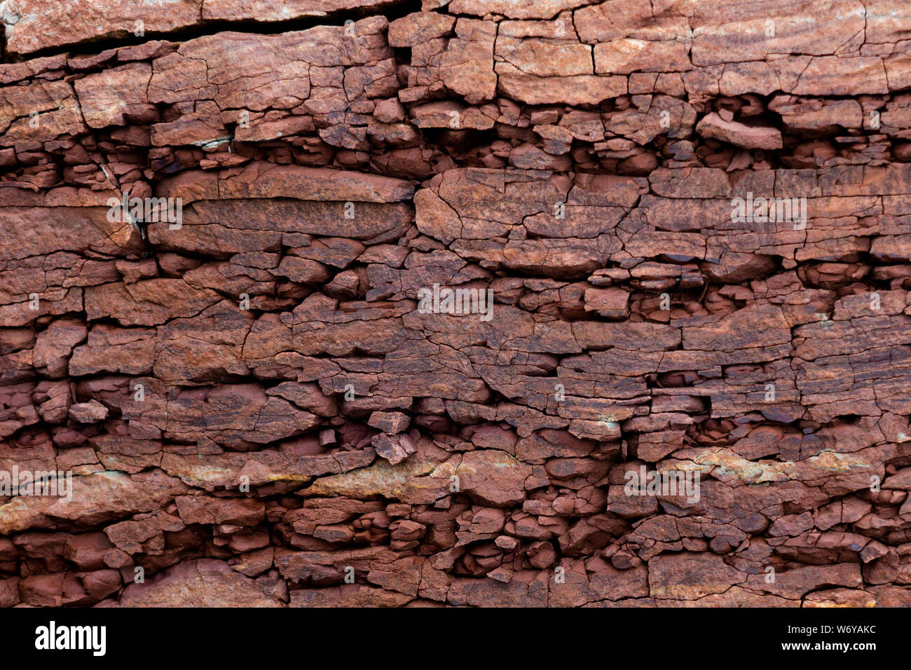 Soil cut-sandstone, stones, clay, sand structure and layers. slice of ...