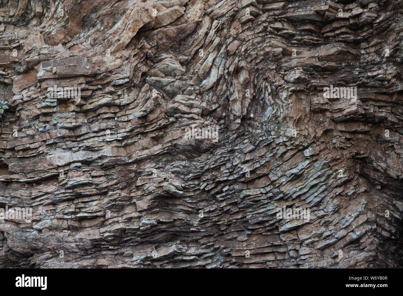 Soil cut-sandstone, stones, clay, sand structure and layers. slice of ...