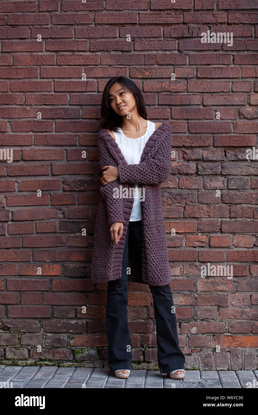 Hugging wall hi-res stock photography and images - Alamy