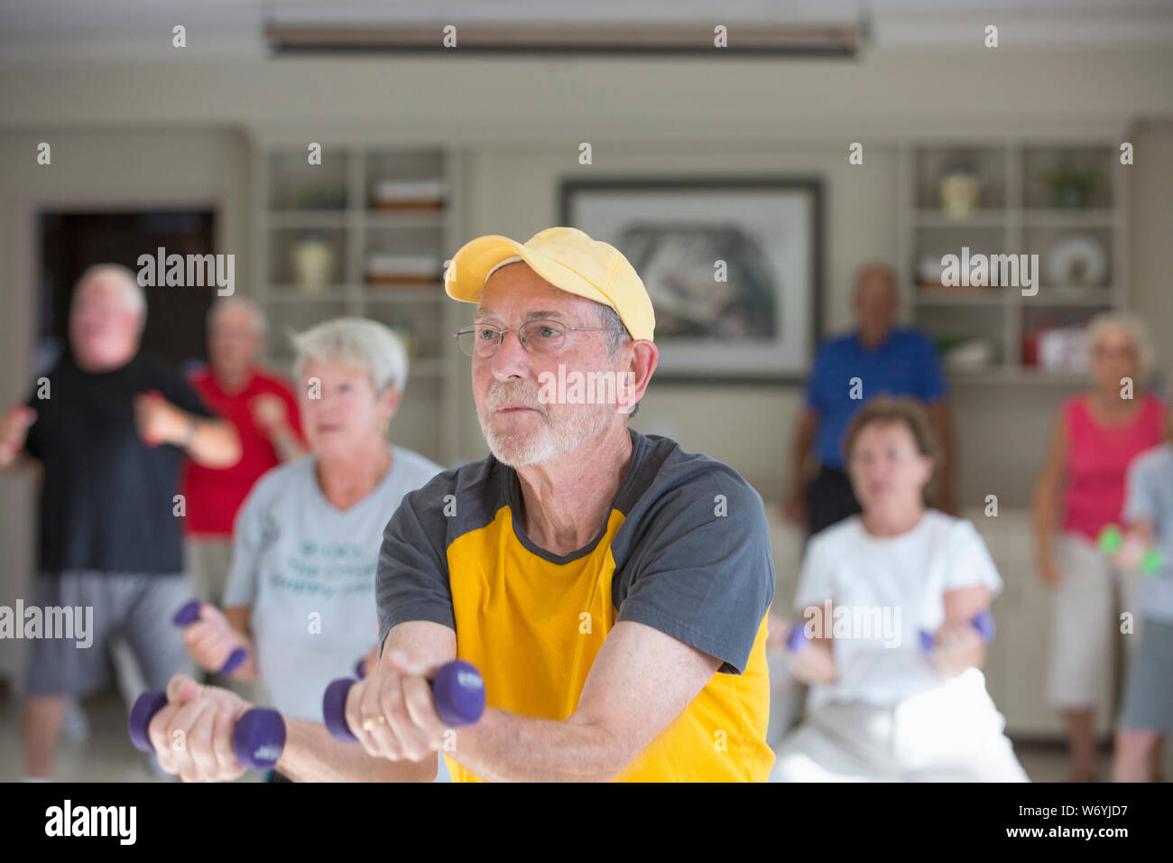 Seniors exercising in gym hi-res stock photography and images - Alamy