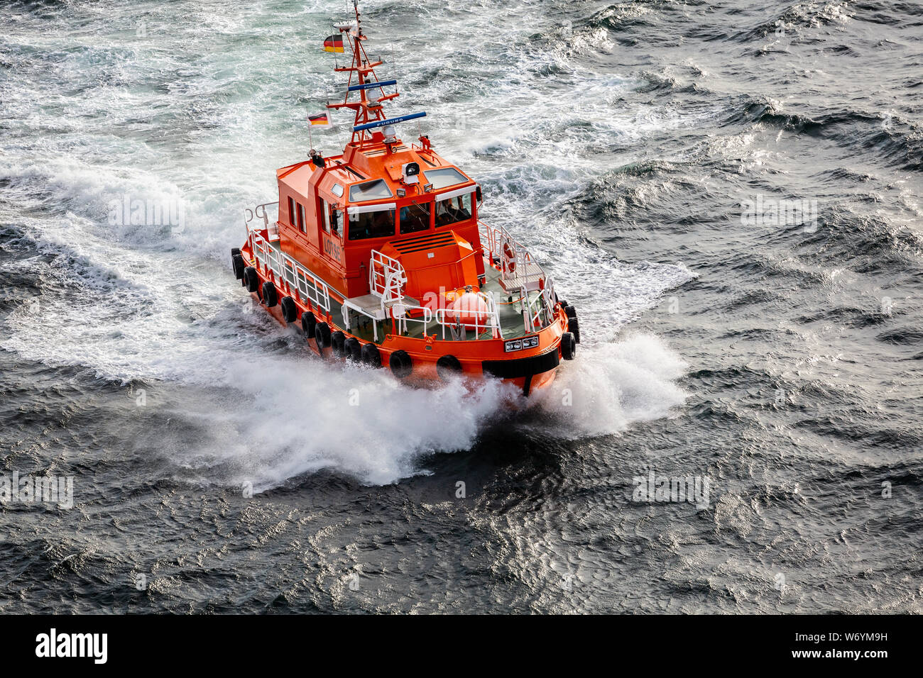 German Pilot Boat crashing through the waves at high speed at sea near ...