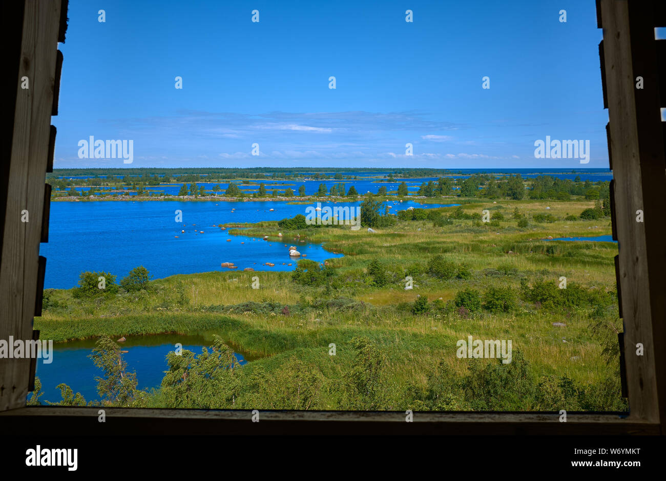 Summer landscape in FInland from wooden window, Mustasaari. The place ...