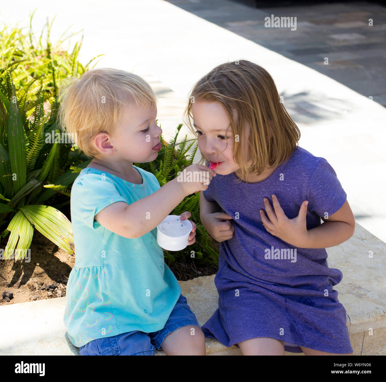 Kids Sharing Ice Cream High Resolution Stock Photography and Images - Alamy