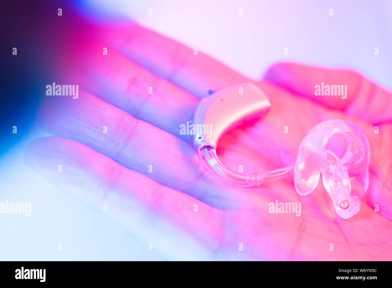 Modern digital hearing aid for deafness and deaf people Stock Photo - Alamy