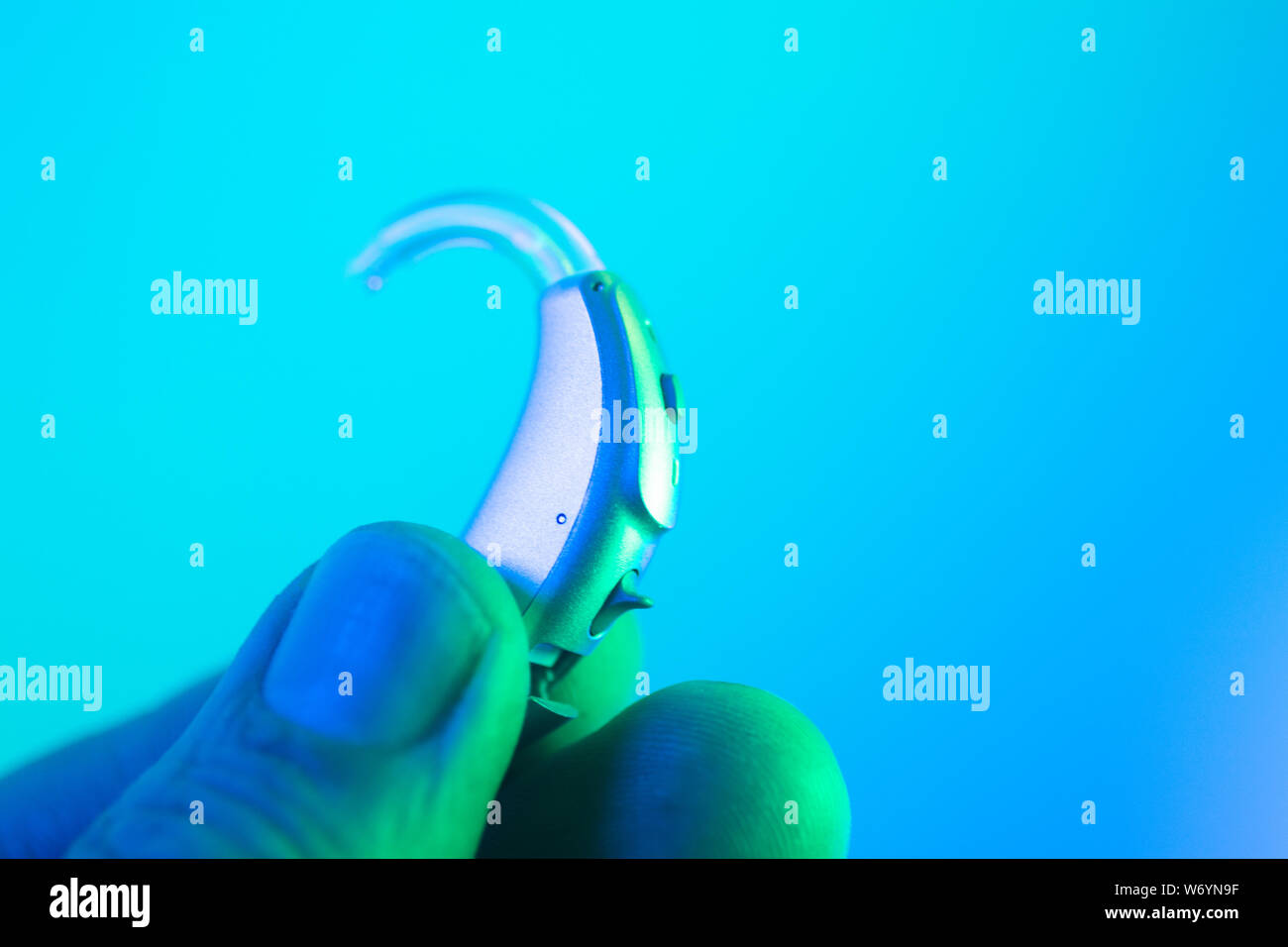 Modern digital hearing aid for deafness and deaf people Stock Photo - Alamy