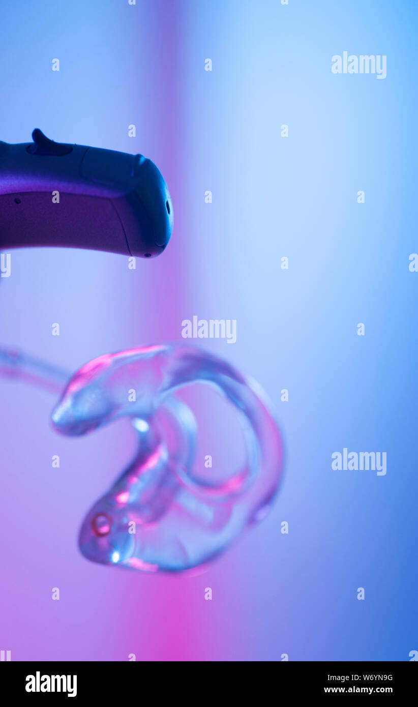 Modern digital hearing aid for deafness and deaf people Stock Photo - Alamy