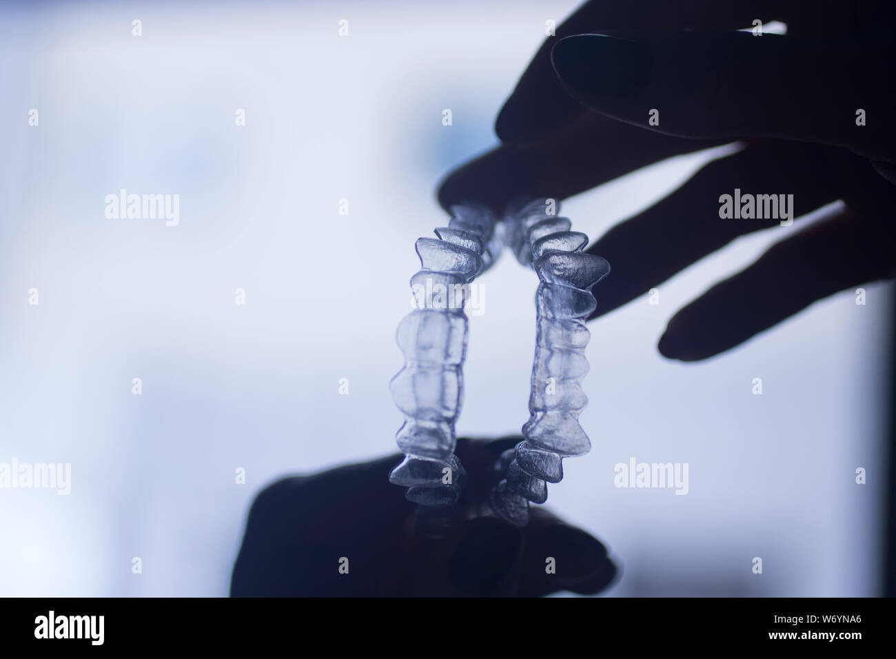 Clear dental teeth retainer brackets to straighten and align each tooth ...