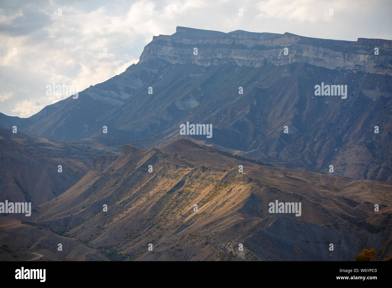 Image of picturesque mountain terrain, blue sky with clouds Stock Photo ...