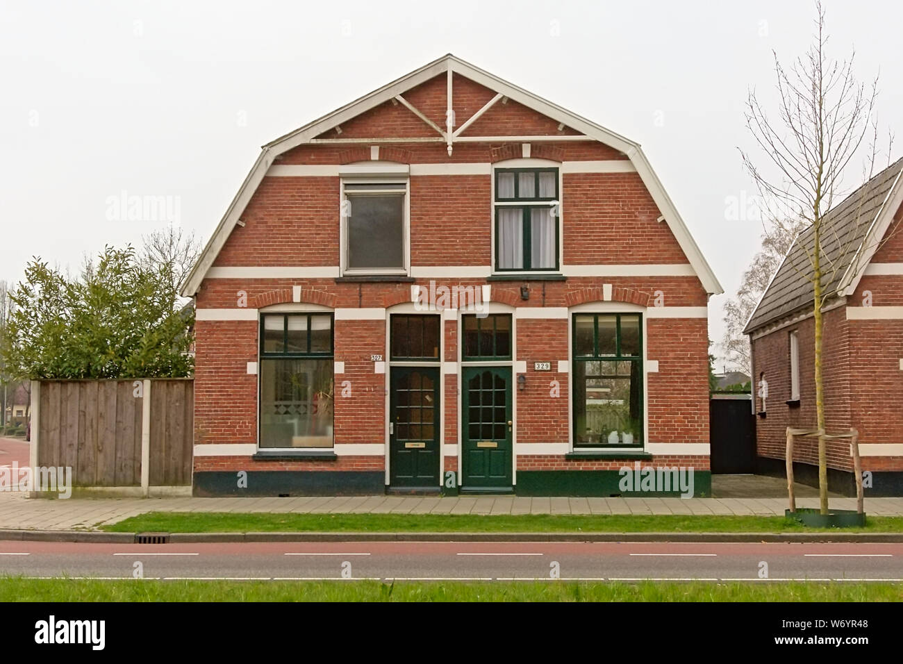 Typical neat and cosy suburban dutch brick stone house. Enschede, the ...