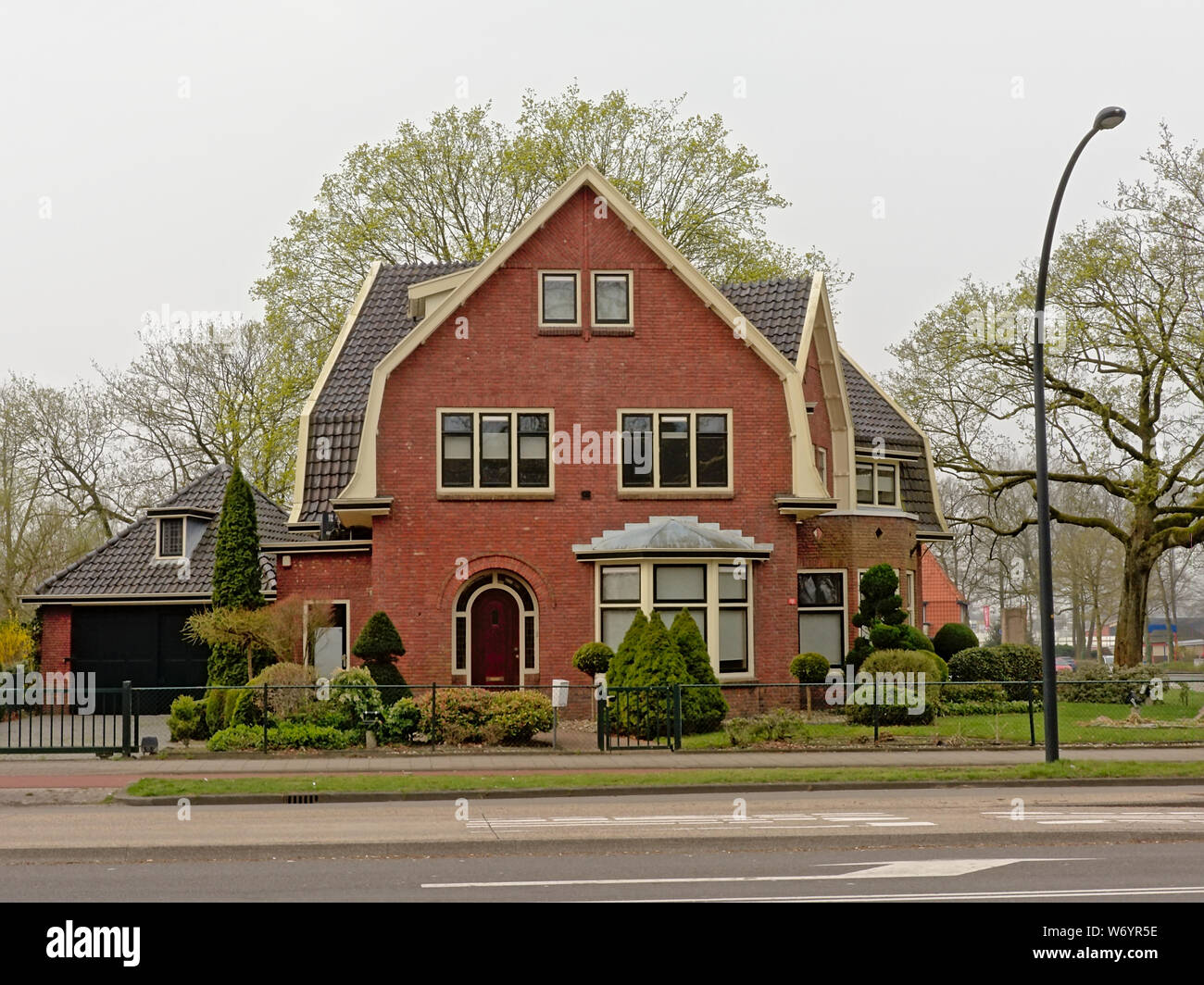 Typical neat and cosy suburban dutch brick stone house. Enschede, the ...