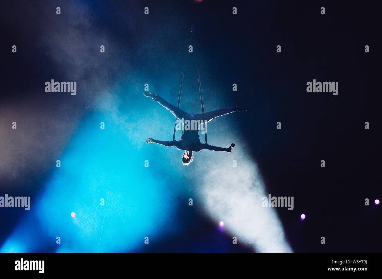 An air acrobat in the circus ring Stock Photo - Alamy