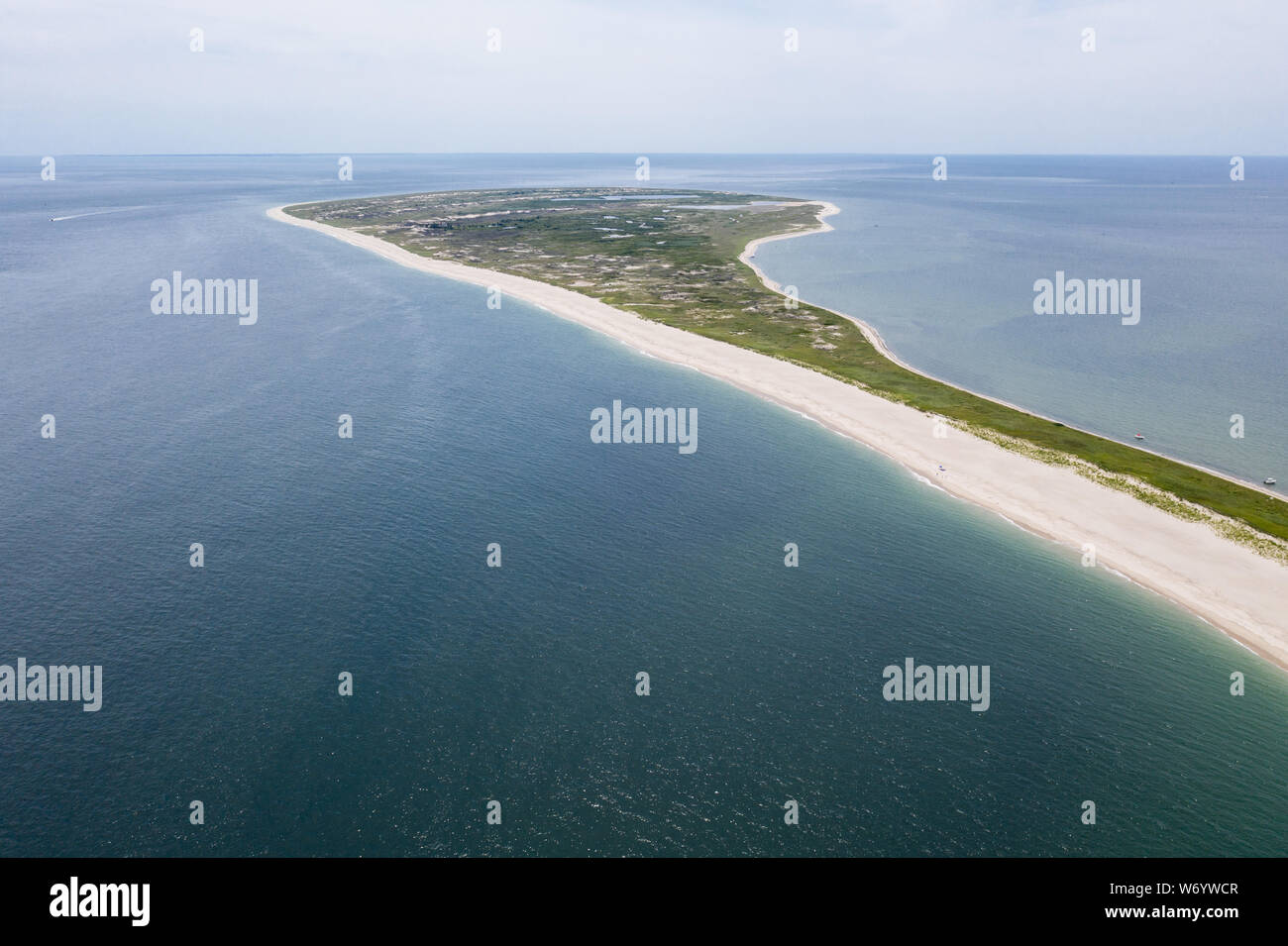 The cold waters of the Atlantic Ocean bathe Monomoy Island on Cape Cod ...