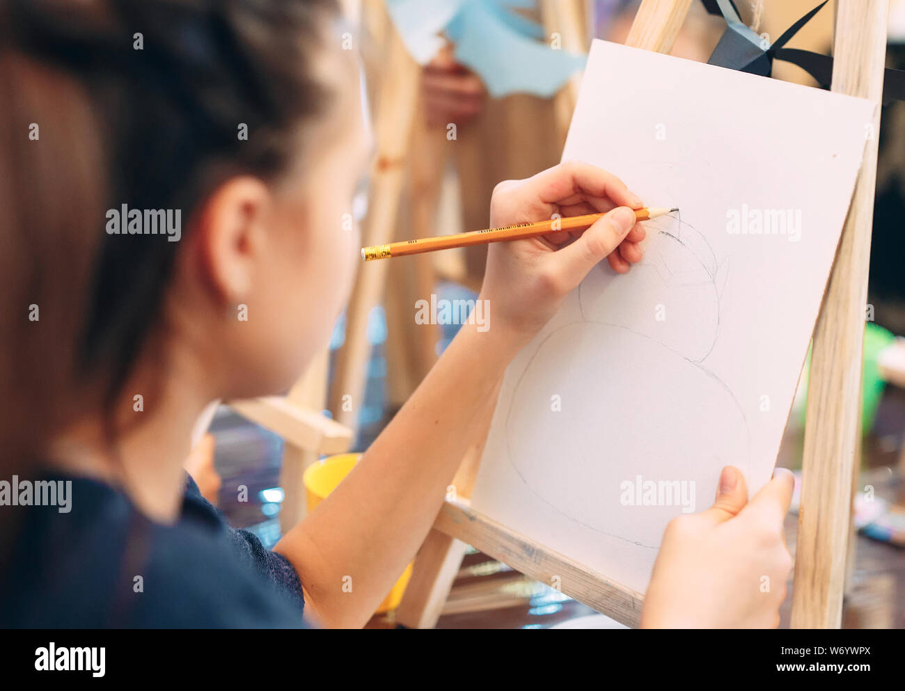 group lesson in drawing. Children learn to draw in the classroom Stock ...