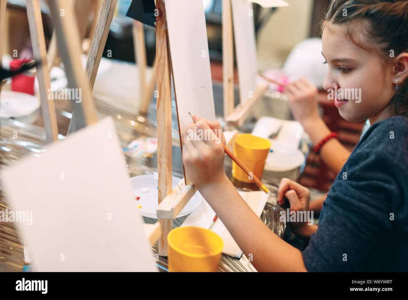 group lesson in drawing. Children learn to draw in the classroom Stock ...