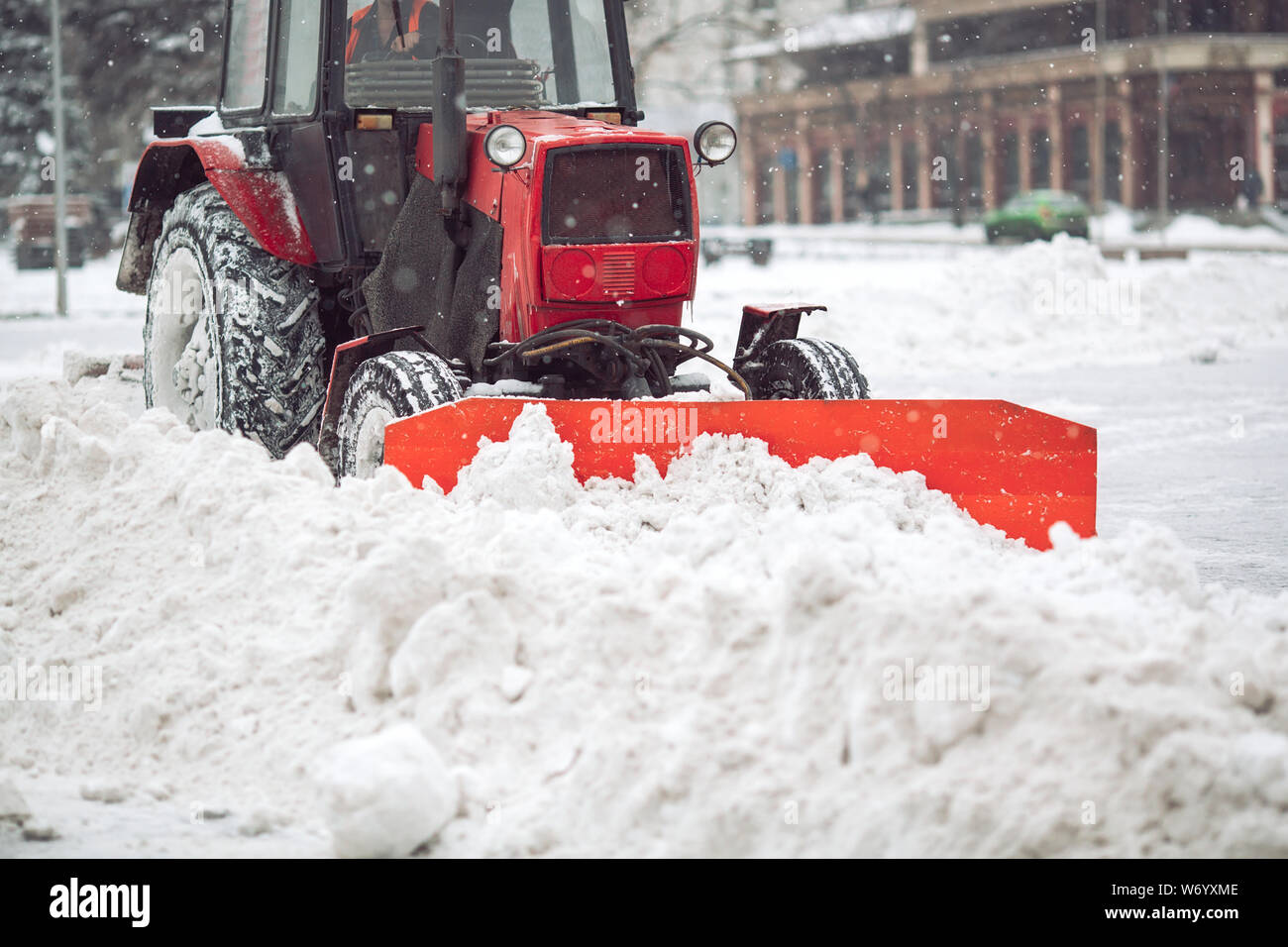 Snow removal tractor cleans hi-res stock photography and images - Alamy