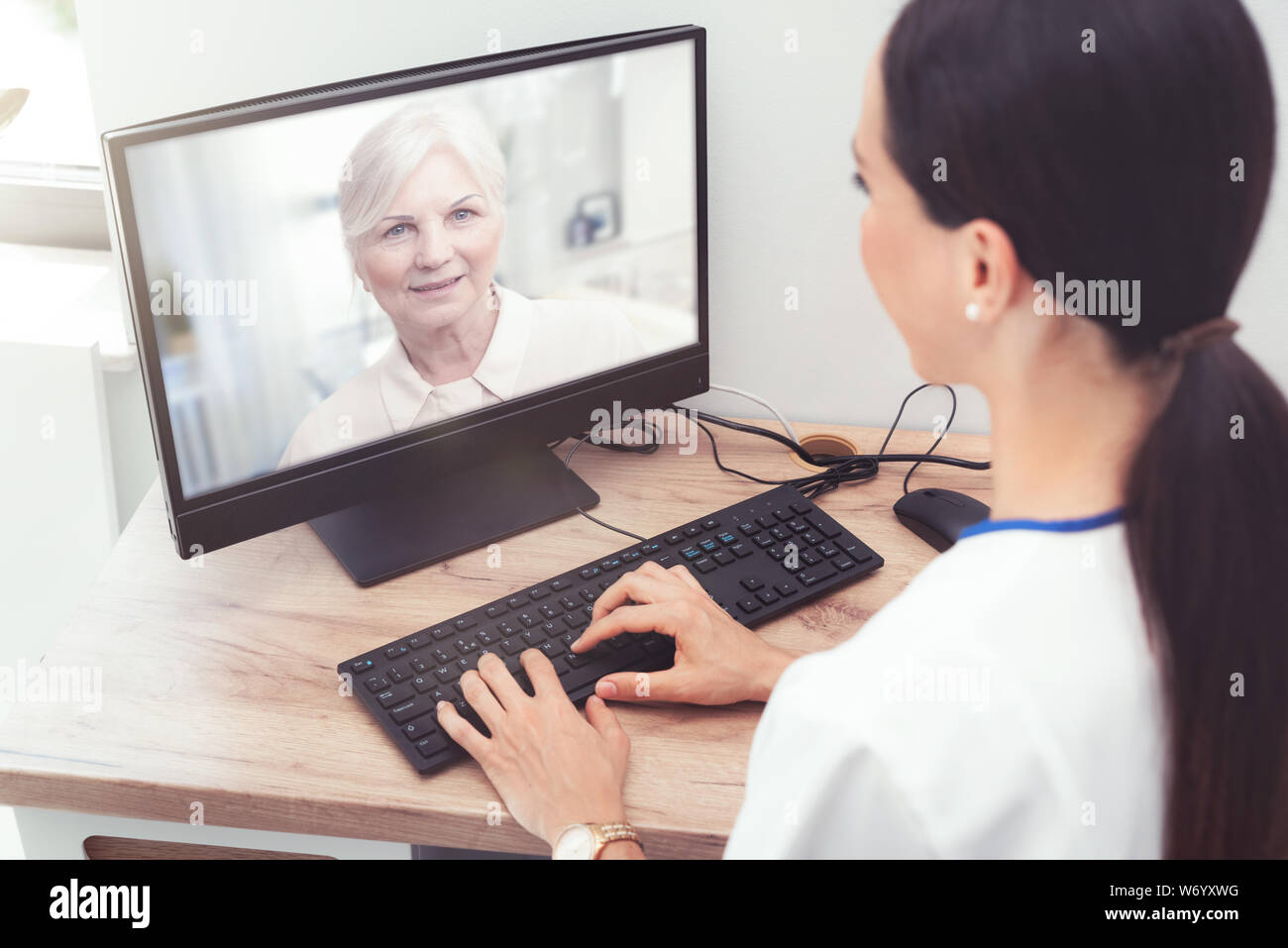 Doctor and senior woman patient medical consultation, telehealth ...
