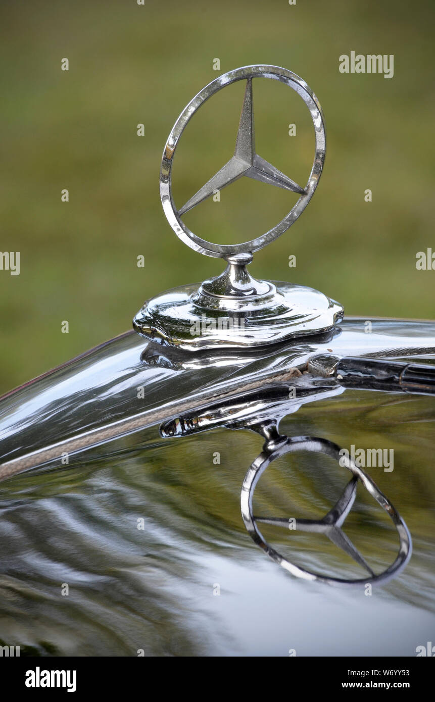 vintage mercedes classic car radiator emblem and reflection Stock Photo ...
