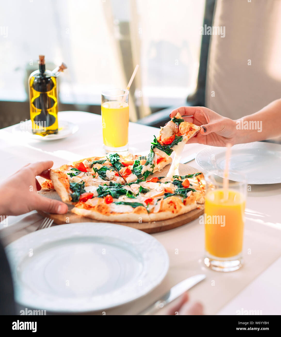 Women friends restaurant pizza hi-res stock photography and images - Alamy