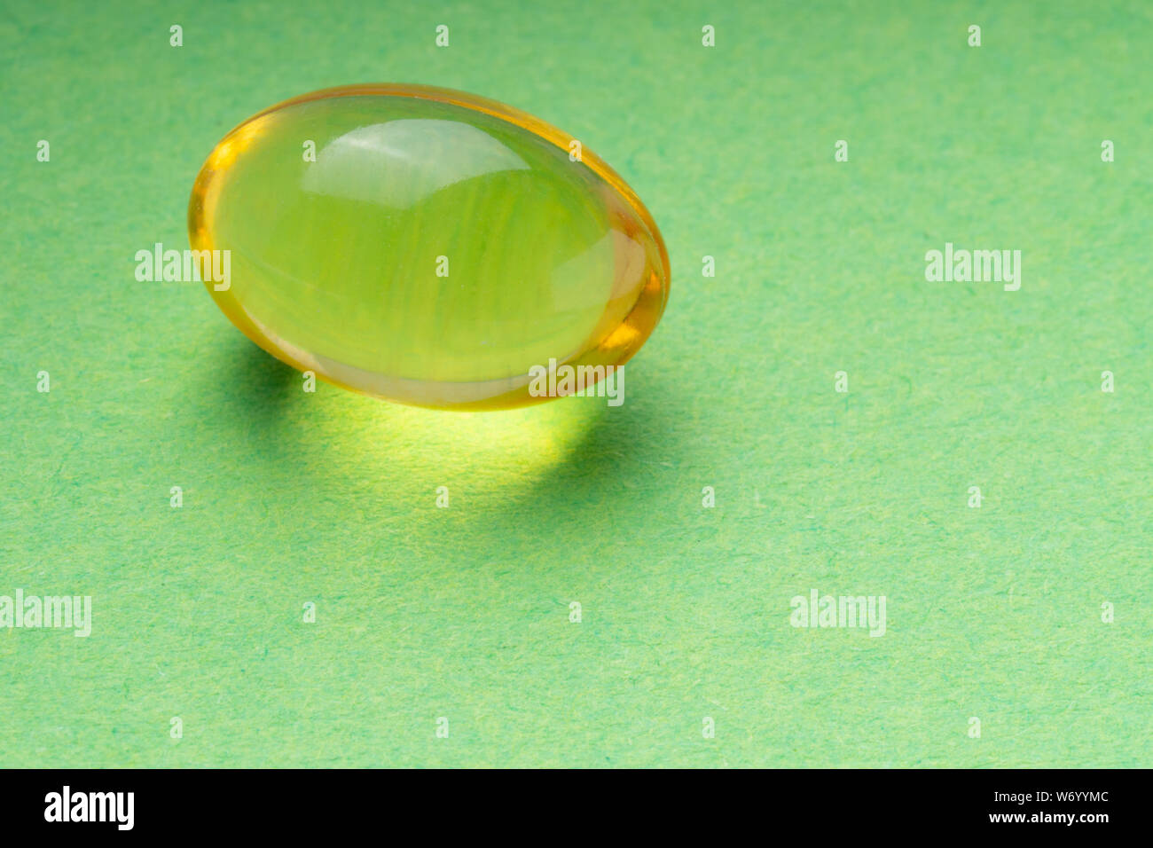 Green natural supplement capsules close hi-res stock photography and ...