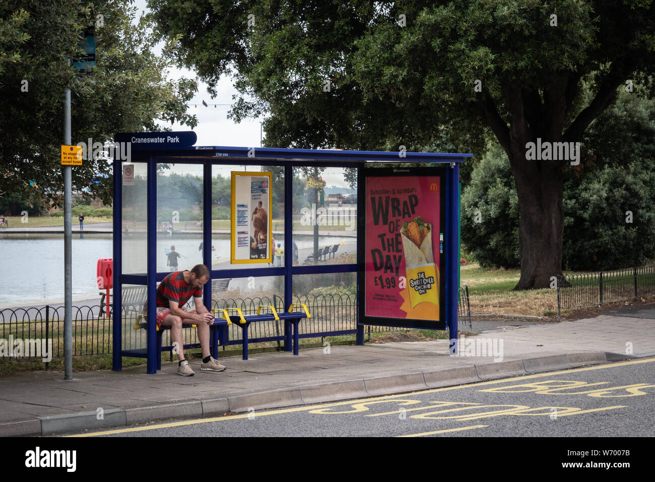 Sitting waiting for a bus hi-res stock photography and images - Alamy