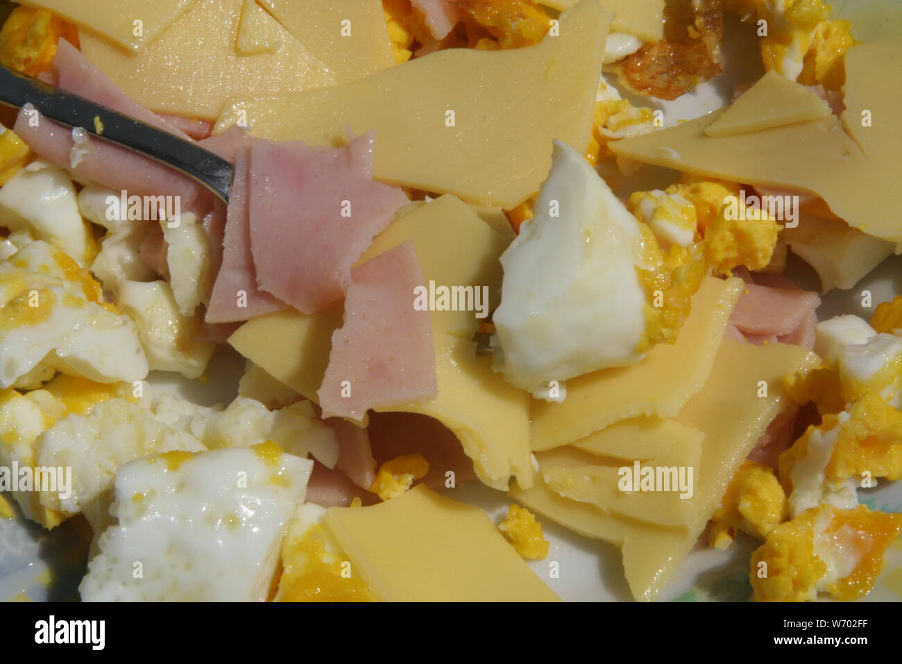 Ham and eggs. Healthy breakfast. Scrambled eggs and ham and cheese ...