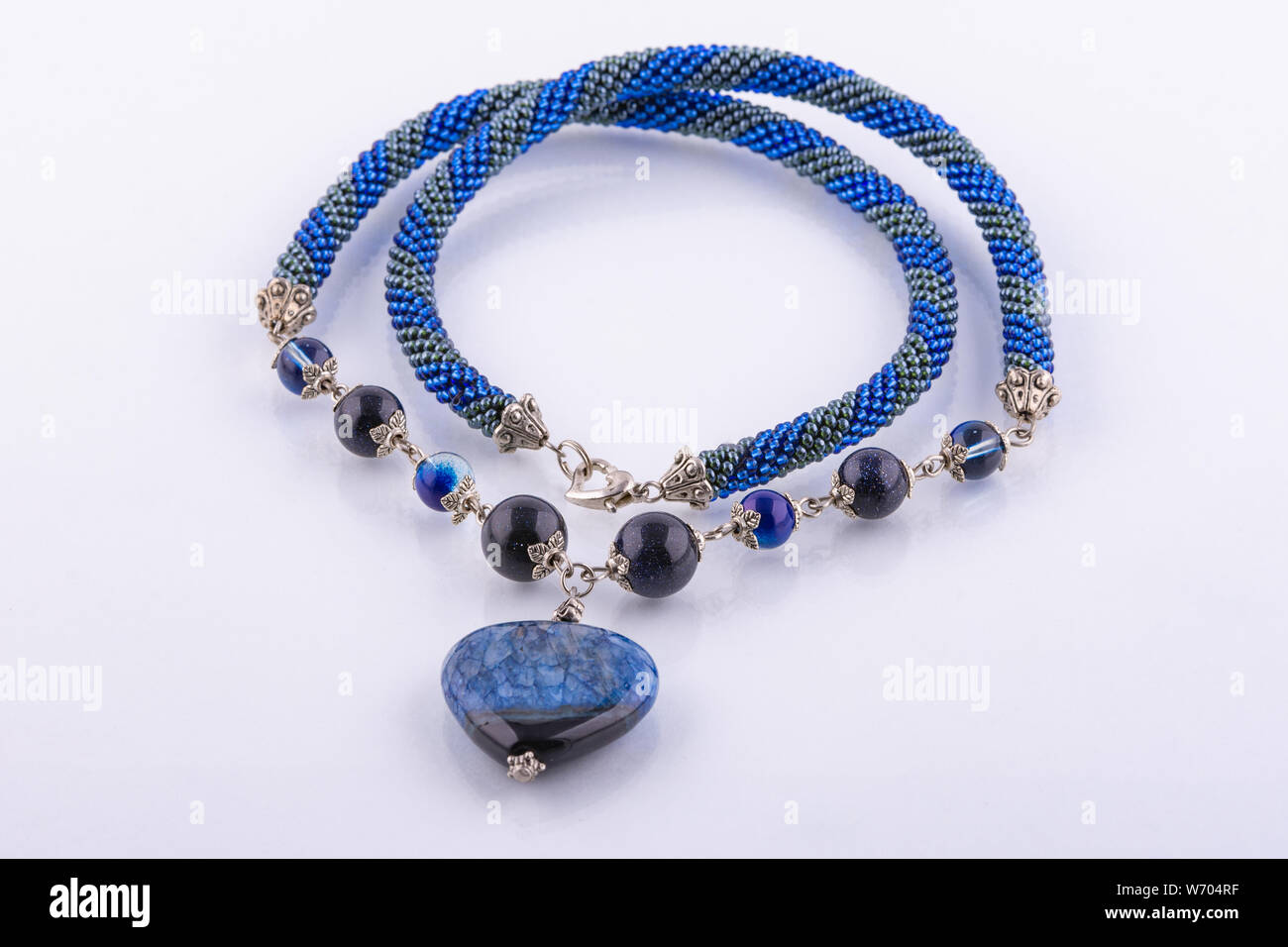 Handmade beaded blue necklace Stock Photo - Alamy