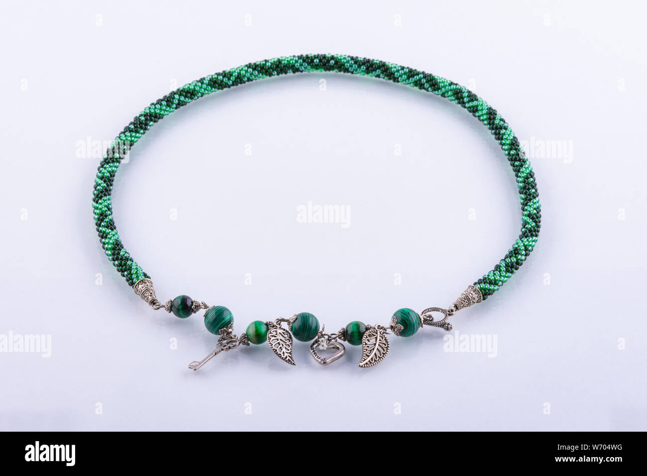 Handmade small bead necklace Stock Photo - Alamy
