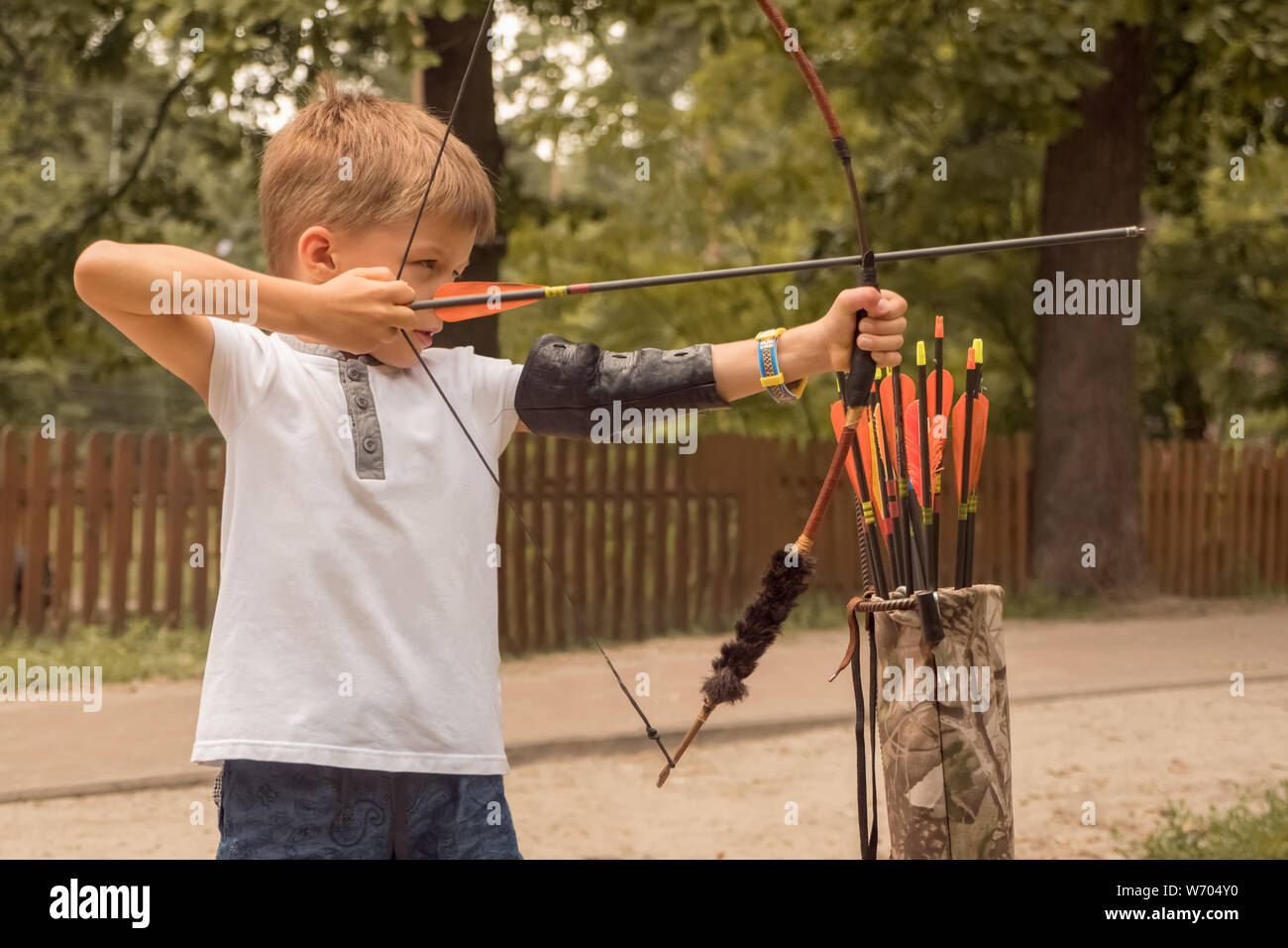 Boy with bow hi-res stock photography and images - Alamy