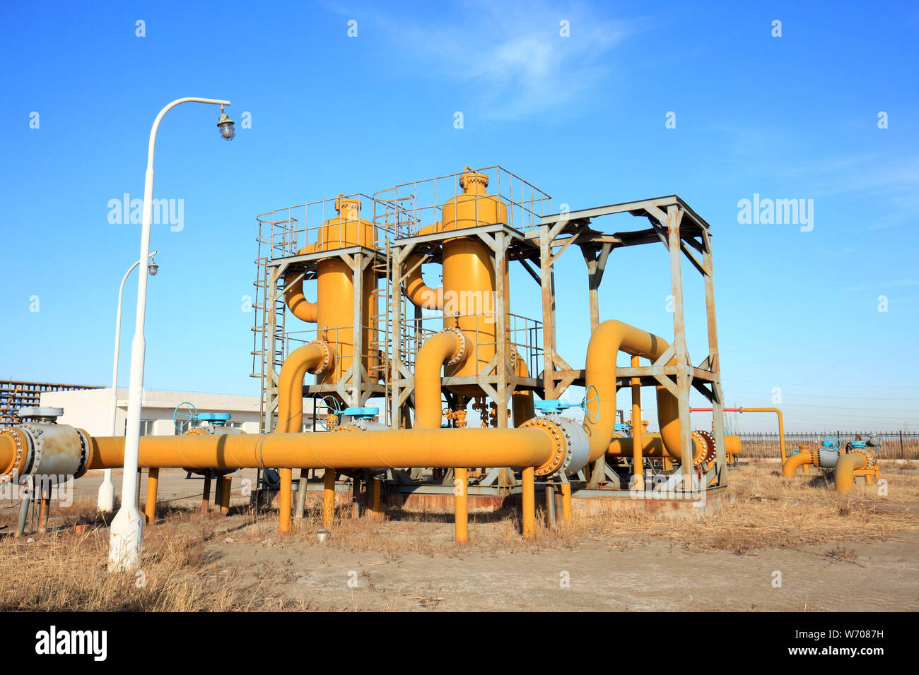 Oilfield equipment, oil field landscape Stock Photo - Alamy