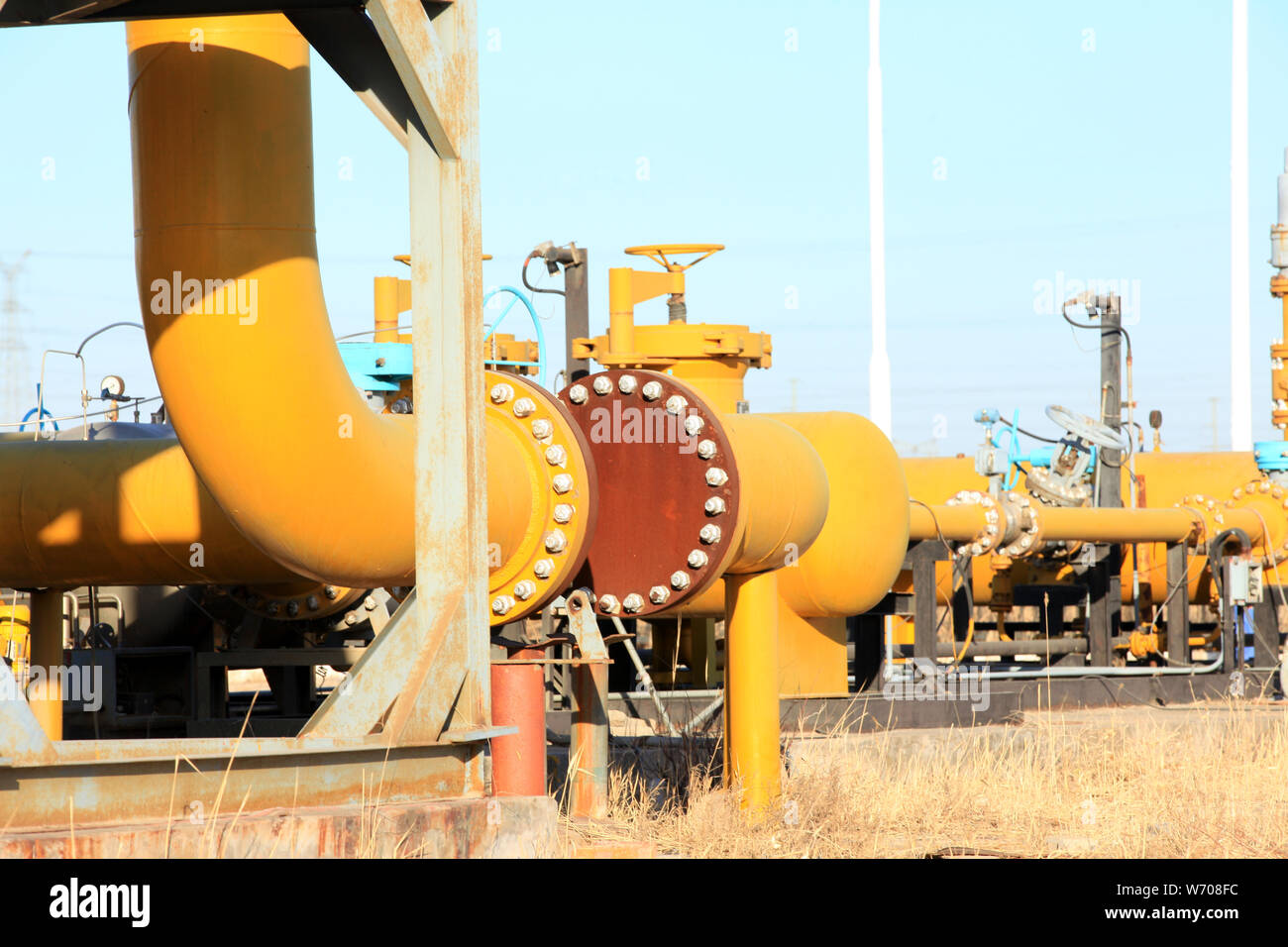 Oilfield equipment, oil field landscape Stock Photo - Alamy