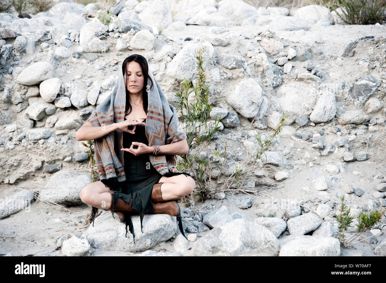 Hippy woman meditating hi-res stock photography and images - Alamy